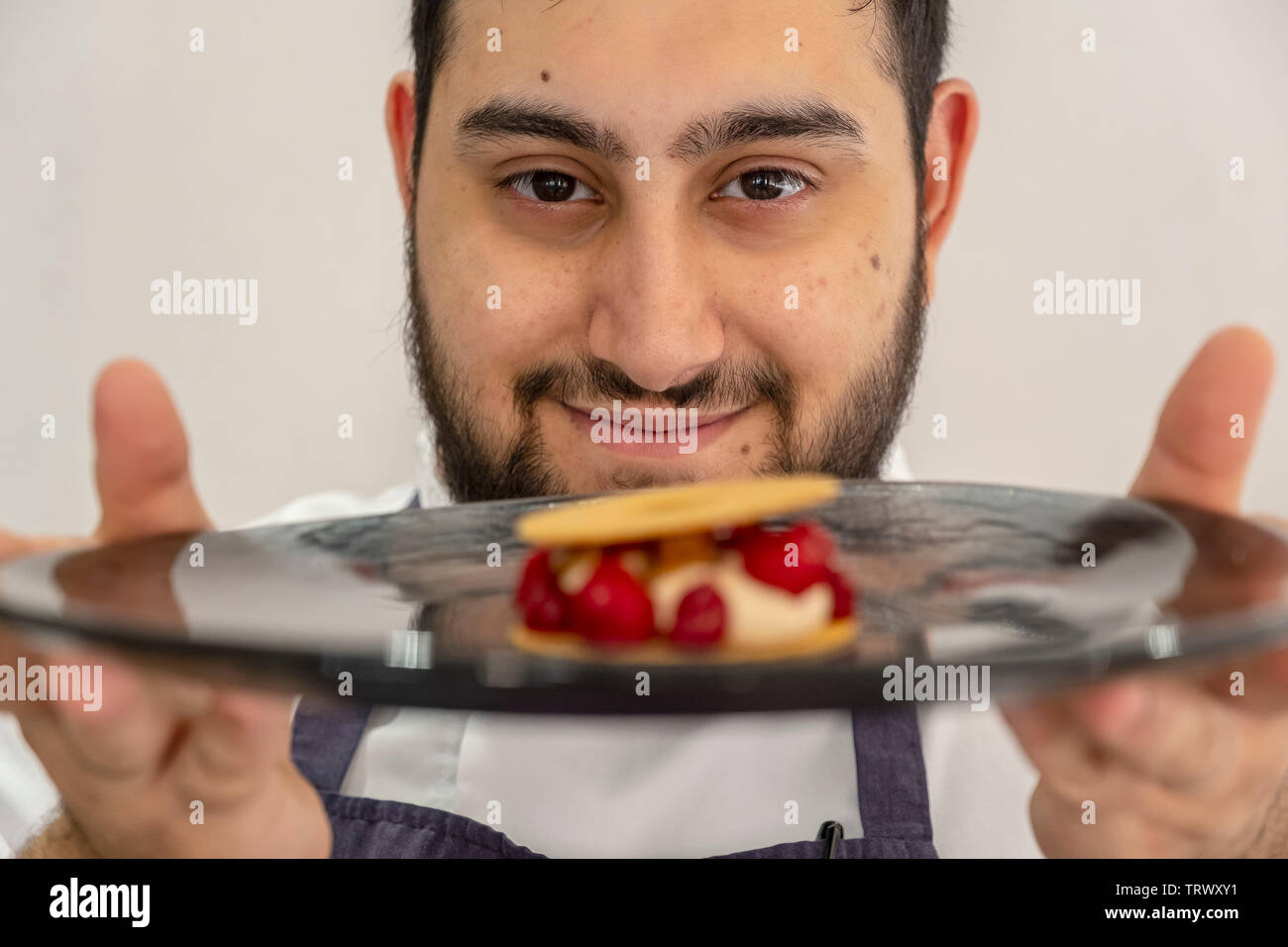 Harvey Perttola, head chef of Maribel restaurant, showing The dish duck ...