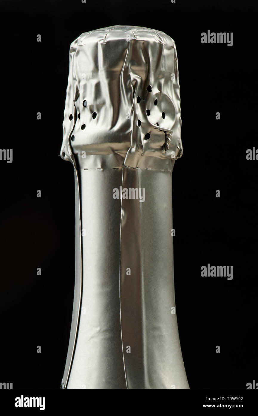 Tall champagne silver bottle head isolated on black background Stock ...