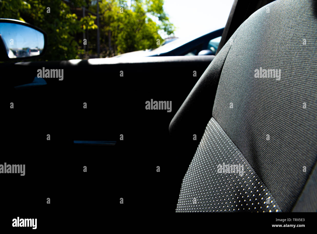 Wait inside a car looking out the window Stock Photo - Alamy