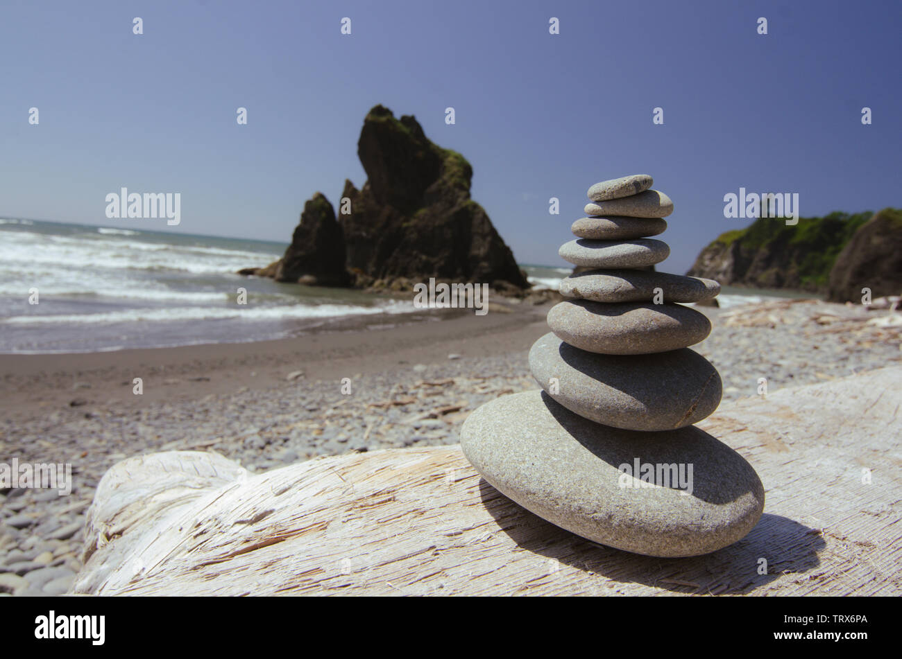rocks stacked on top of each other on a beach Stock Photo - Alamy