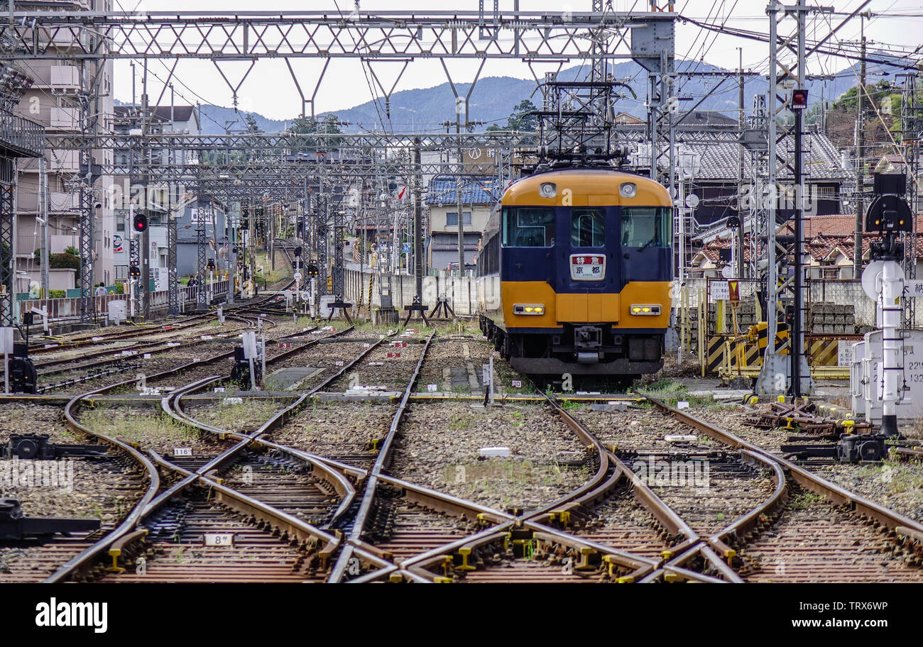 Osaka, Japan - Apr 12, 2019. A local train coming to the JR station in ...