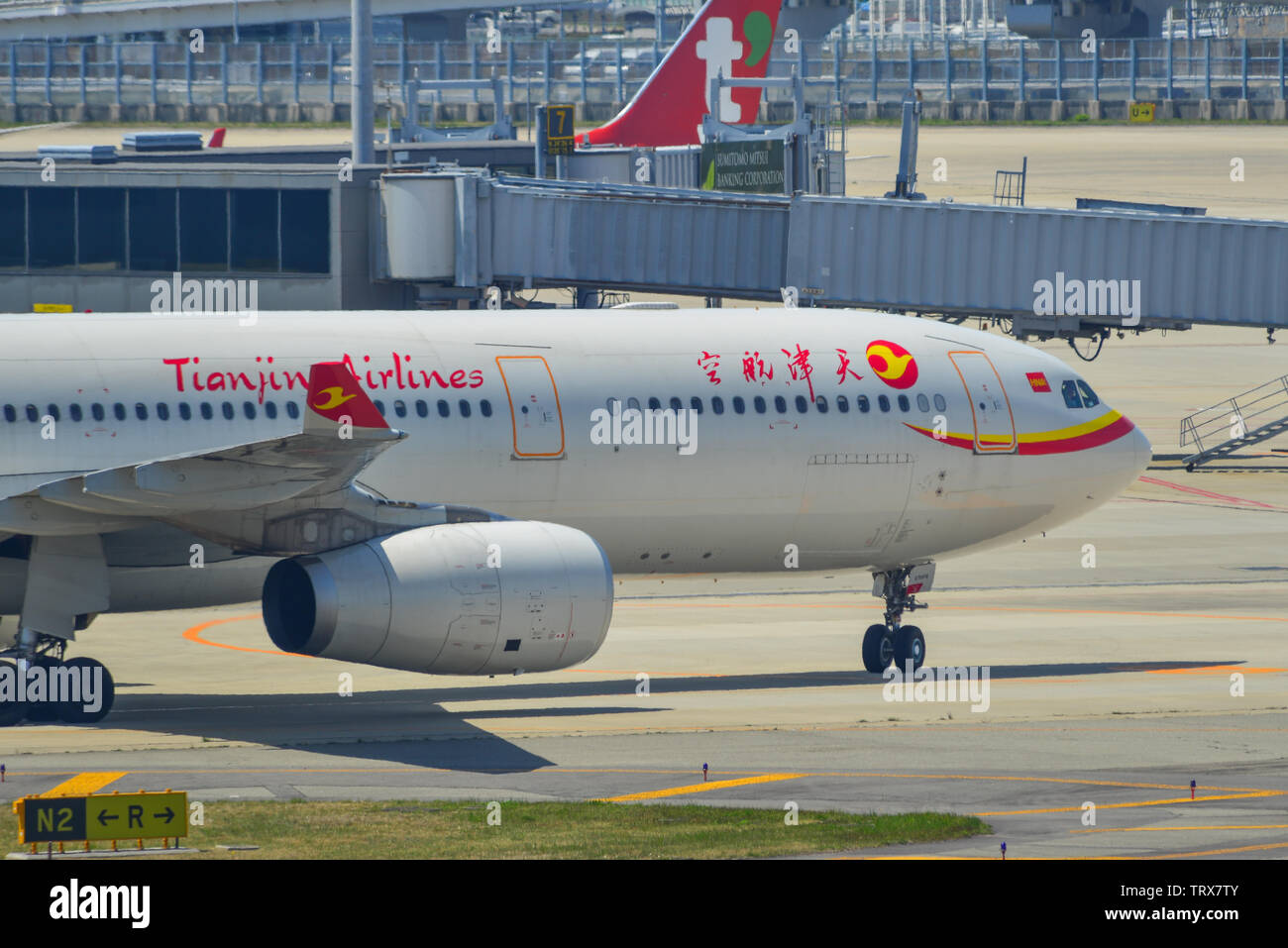 Osaka, Japan - Apr 19, 2019. Tianjin Airlines Airbus A330-200 taxiing ...