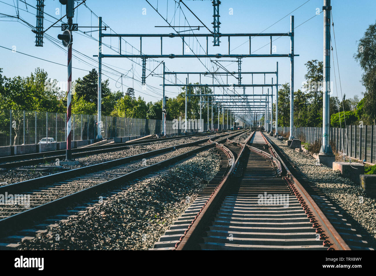 SANTIAGO, CHILE - OCTOBER 2015: A four-track railway in San Bernardo ...