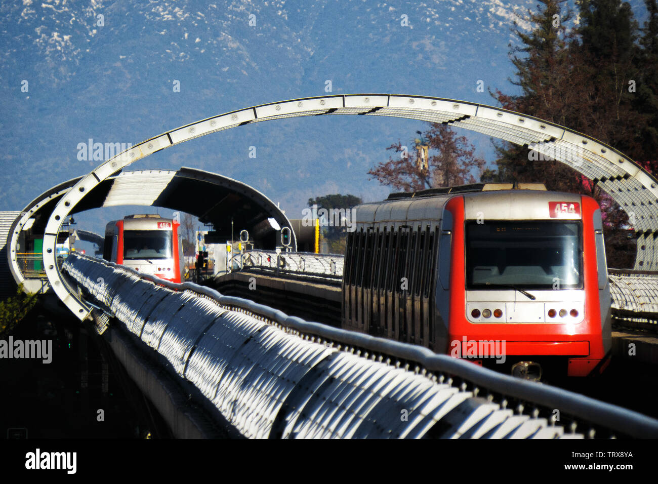 SANTIAGO, CHILE - JUNE 2014: Two Santiago Metro trains on the elevated ...
