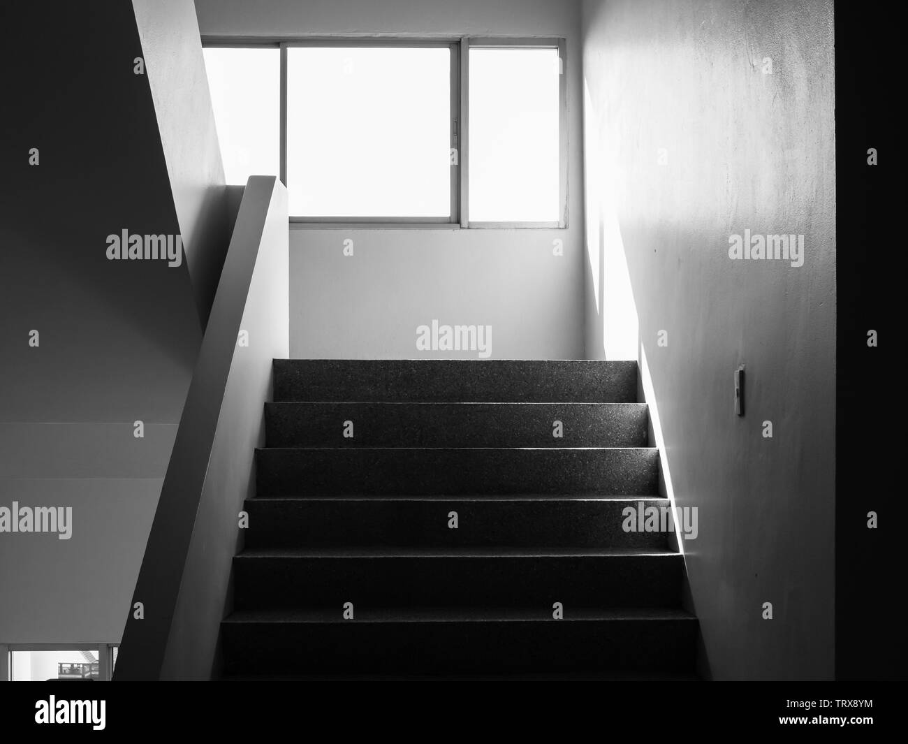 Dark mysterious corridor in building. Stairs in lonely quiet building ...