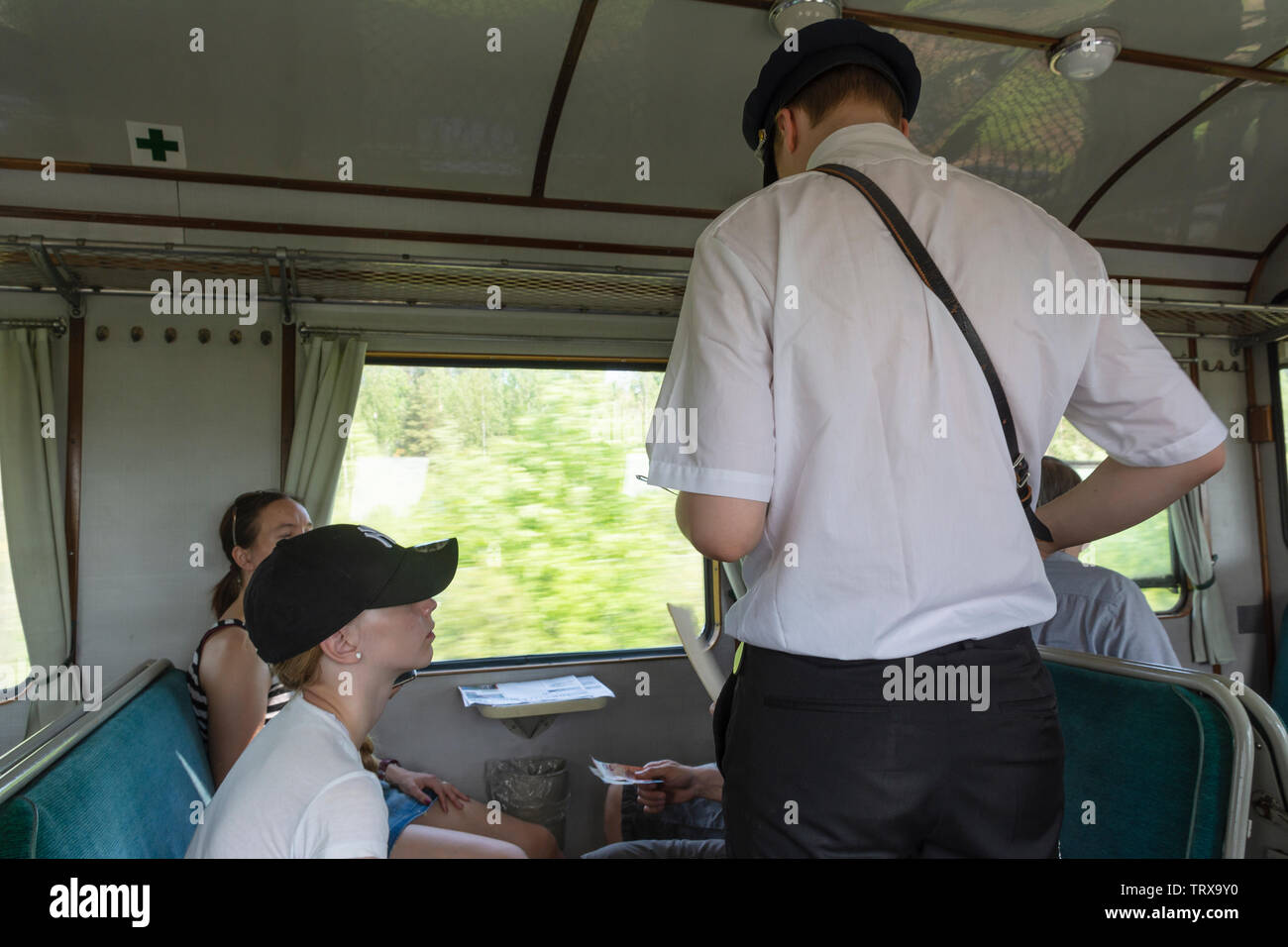 Train conductor tickets hi-res stock photography and images - Alamy