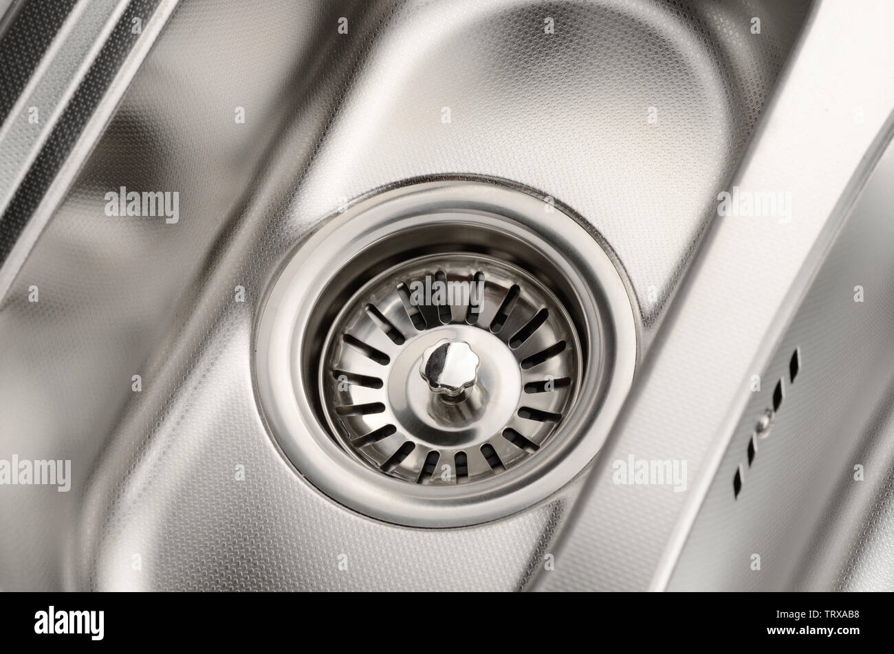 Stainless steel sink with drain. Closeup Stock Photo - Alamy