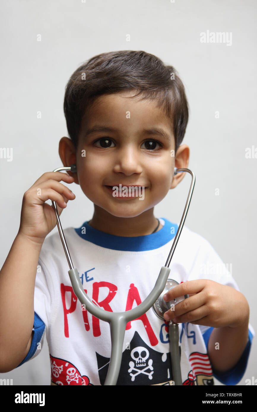 Boy examining his pulse trace Stock Photo - Alamy