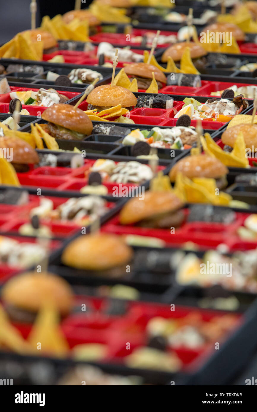 Mini burgers and bento boxes at corporate lunch event Stock Photo - Alamy