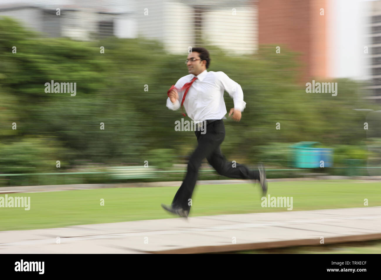 Indian man running in park hi-res stock photography and images - Alamy