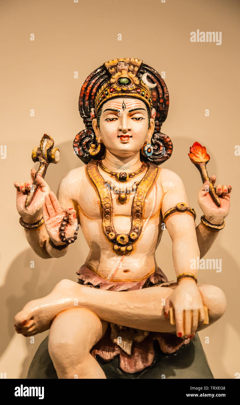traditional style indian god sculpture on white background Stock Photo ...
