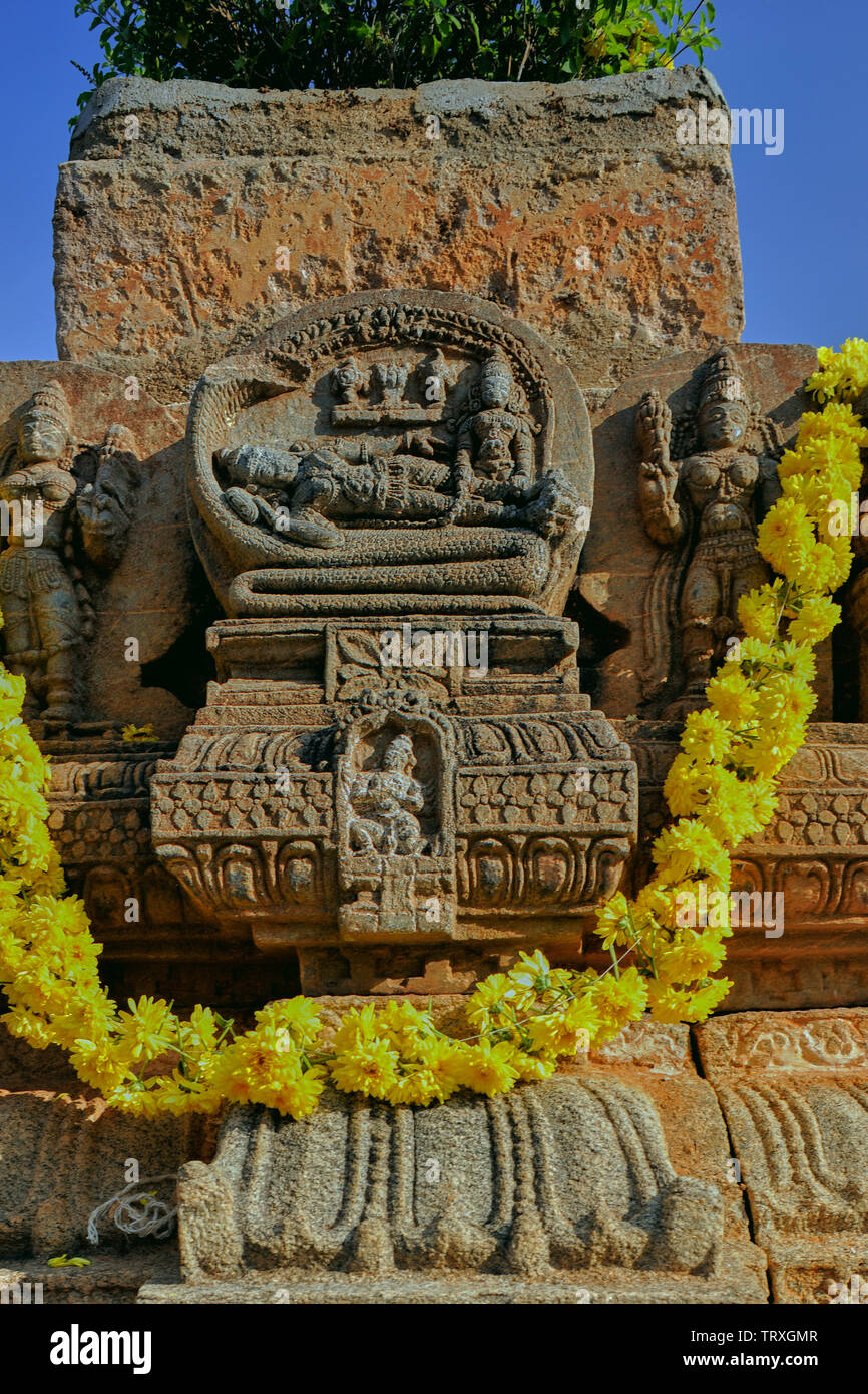 13 Oct 2009 Reclining lord Vishnu on stone carved Tulsi Vrinda at ...