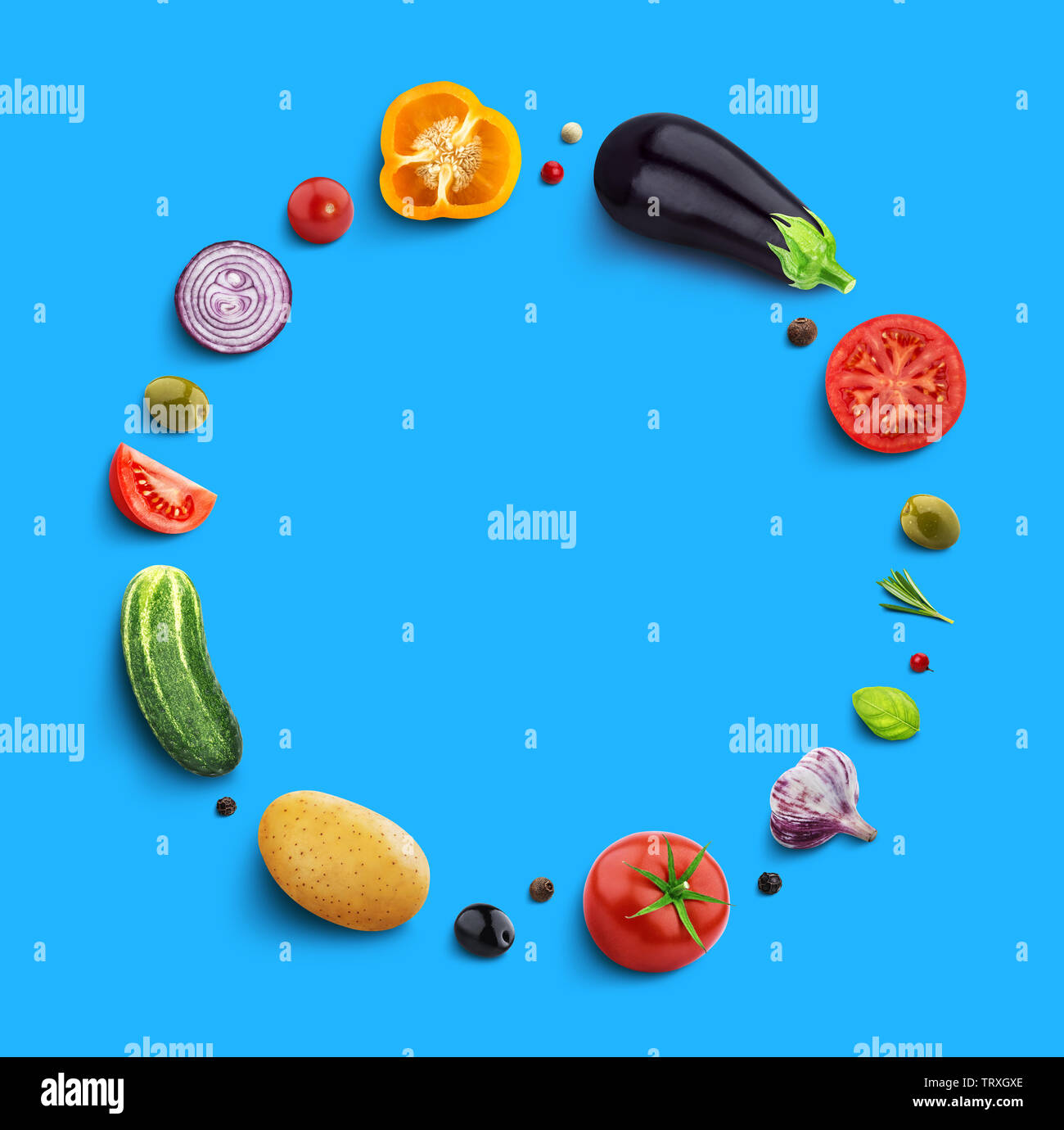 Vegetables on blue background, top view, round frame of vegetable with ...