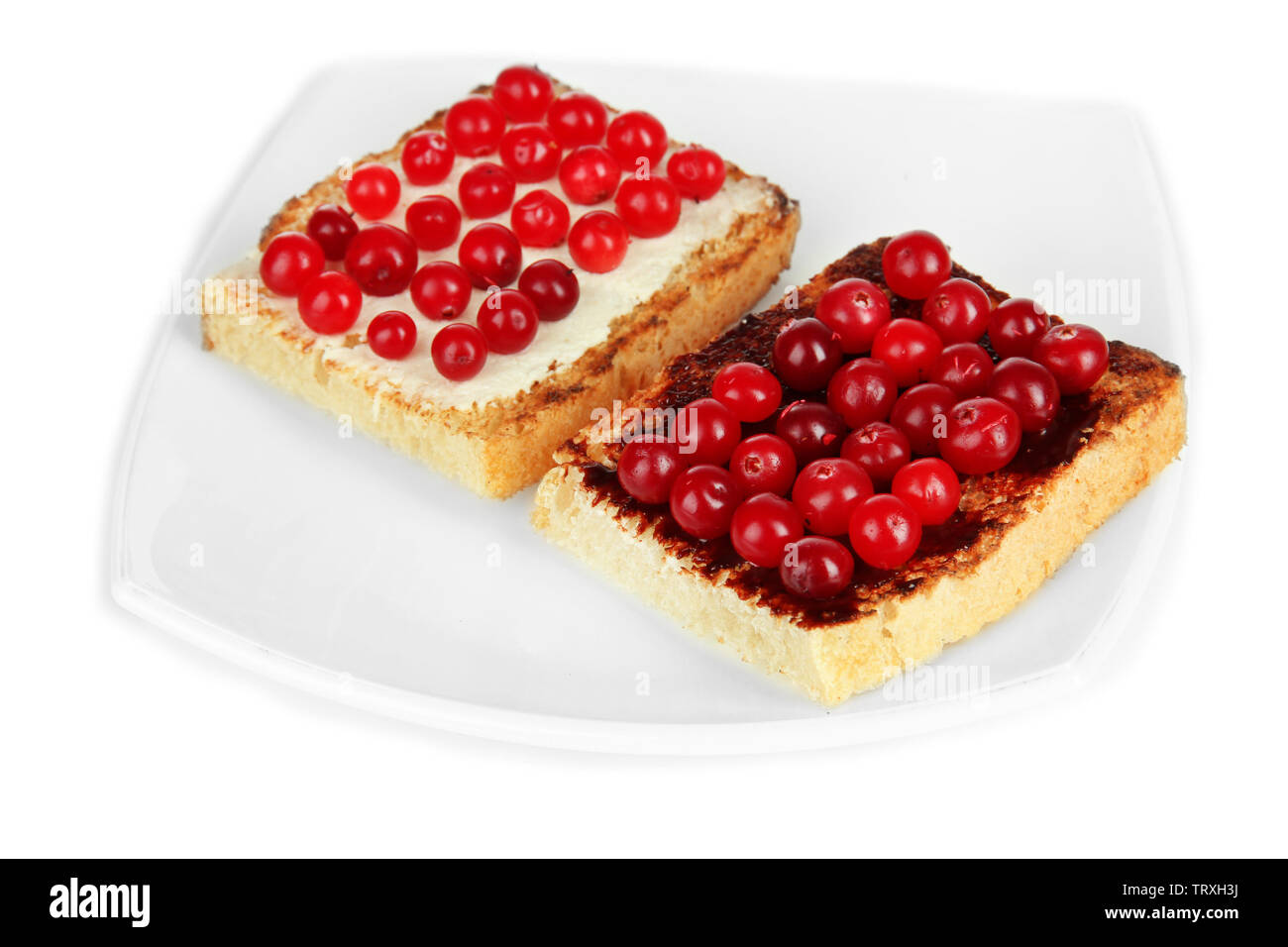 Delicious toast with cranberries isolated on white Stock Photo - Alamy