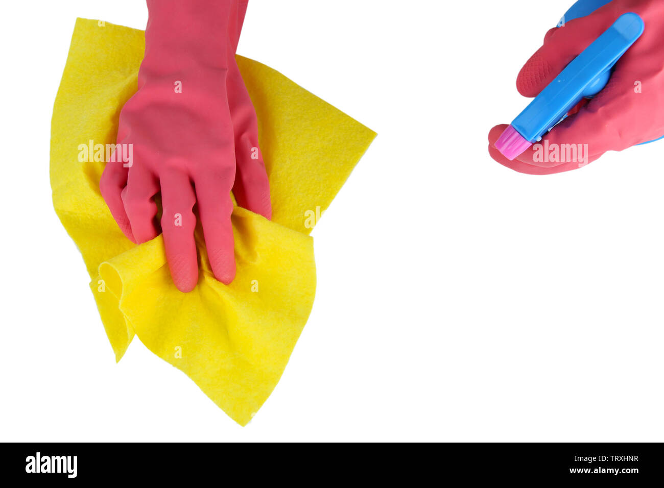 Hands in gloves wiping surface with yellow rag and spray isolated on ...