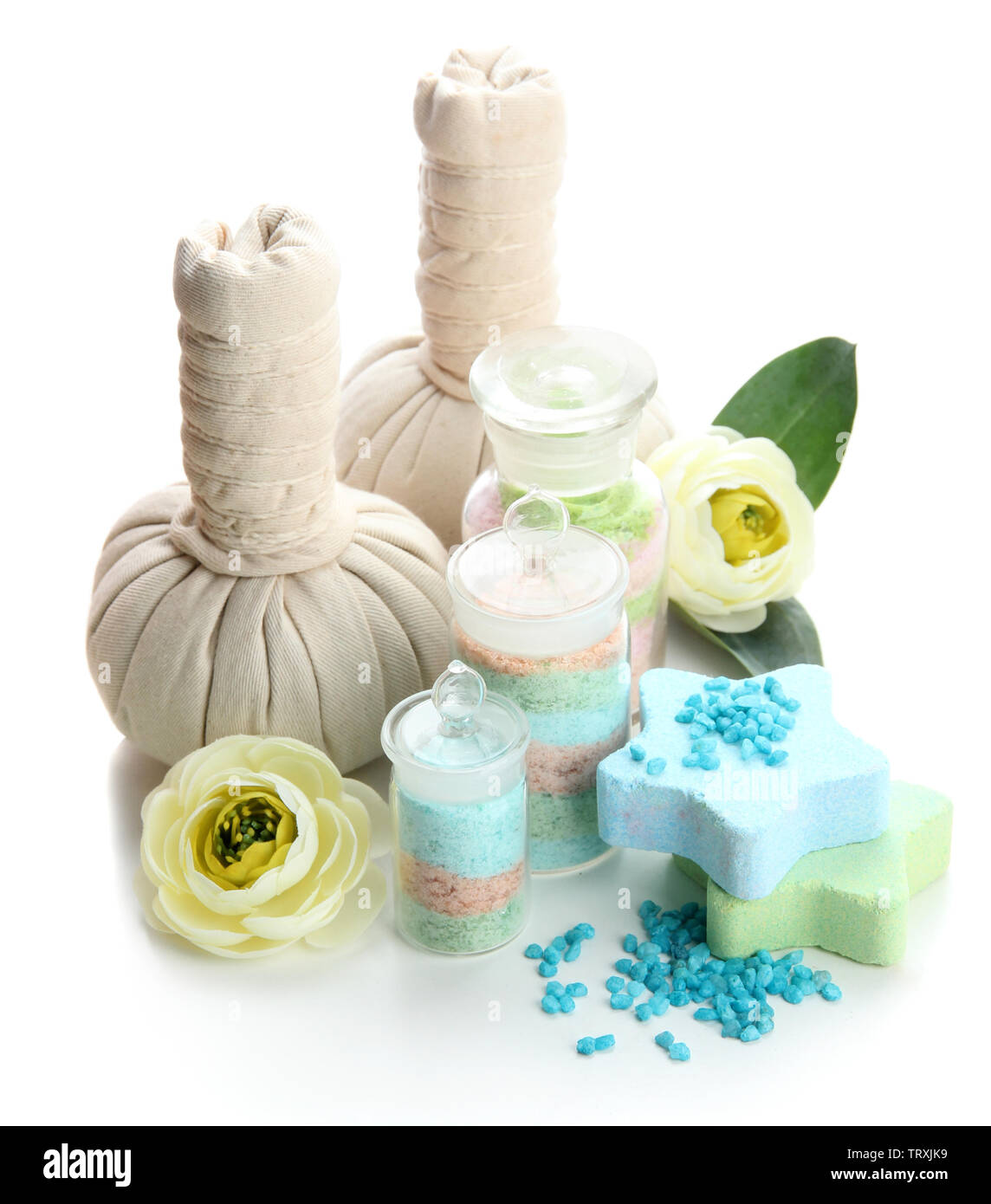 Aromatic salts in glass bottles and herbal compress balls for spa ...