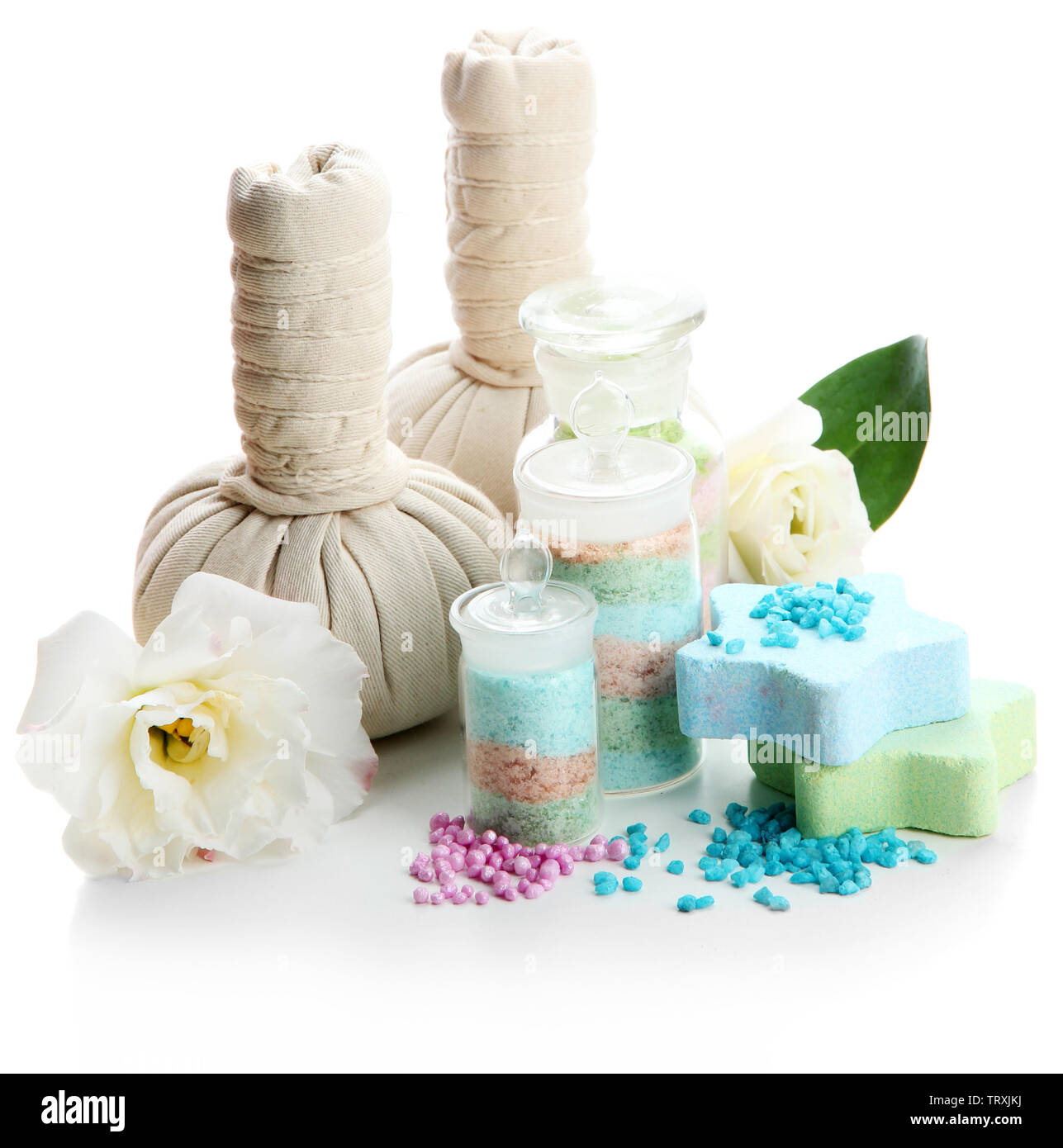 Aromatic salts in glass bottles and herbal compress balls for spa ...
