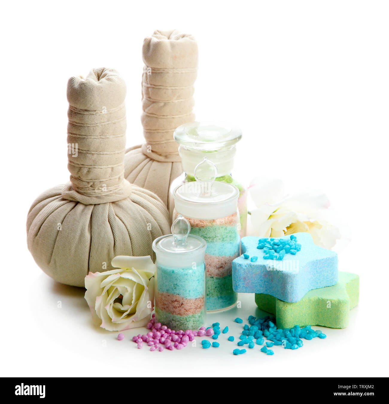 Aromatic salts in glass bottles and herbal compress balls for spa ...