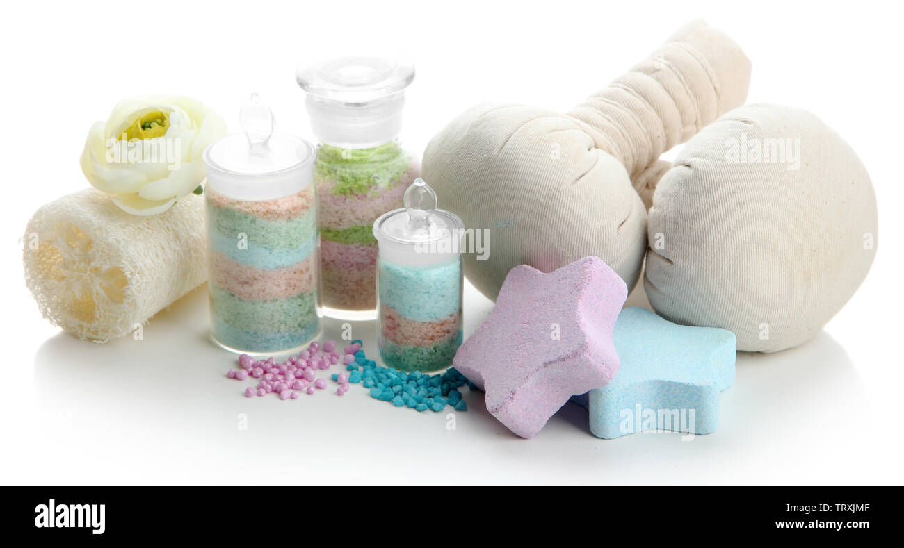 Aromatic salts in glass bottles and herbal compress balls for spa ...