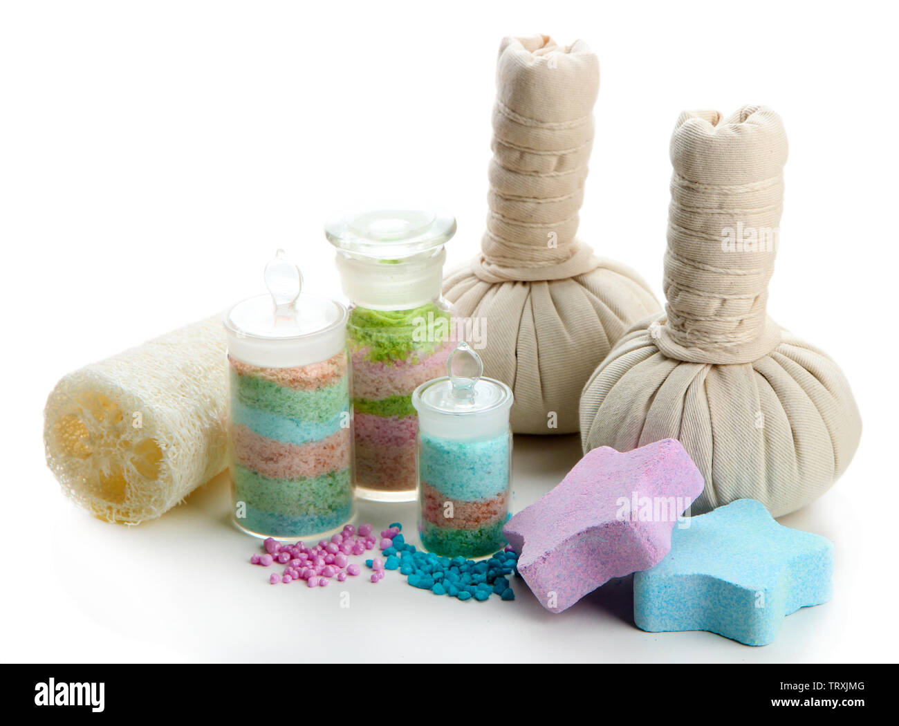 Aromatic salts in glass bottles and herbal compress balls for spa ...