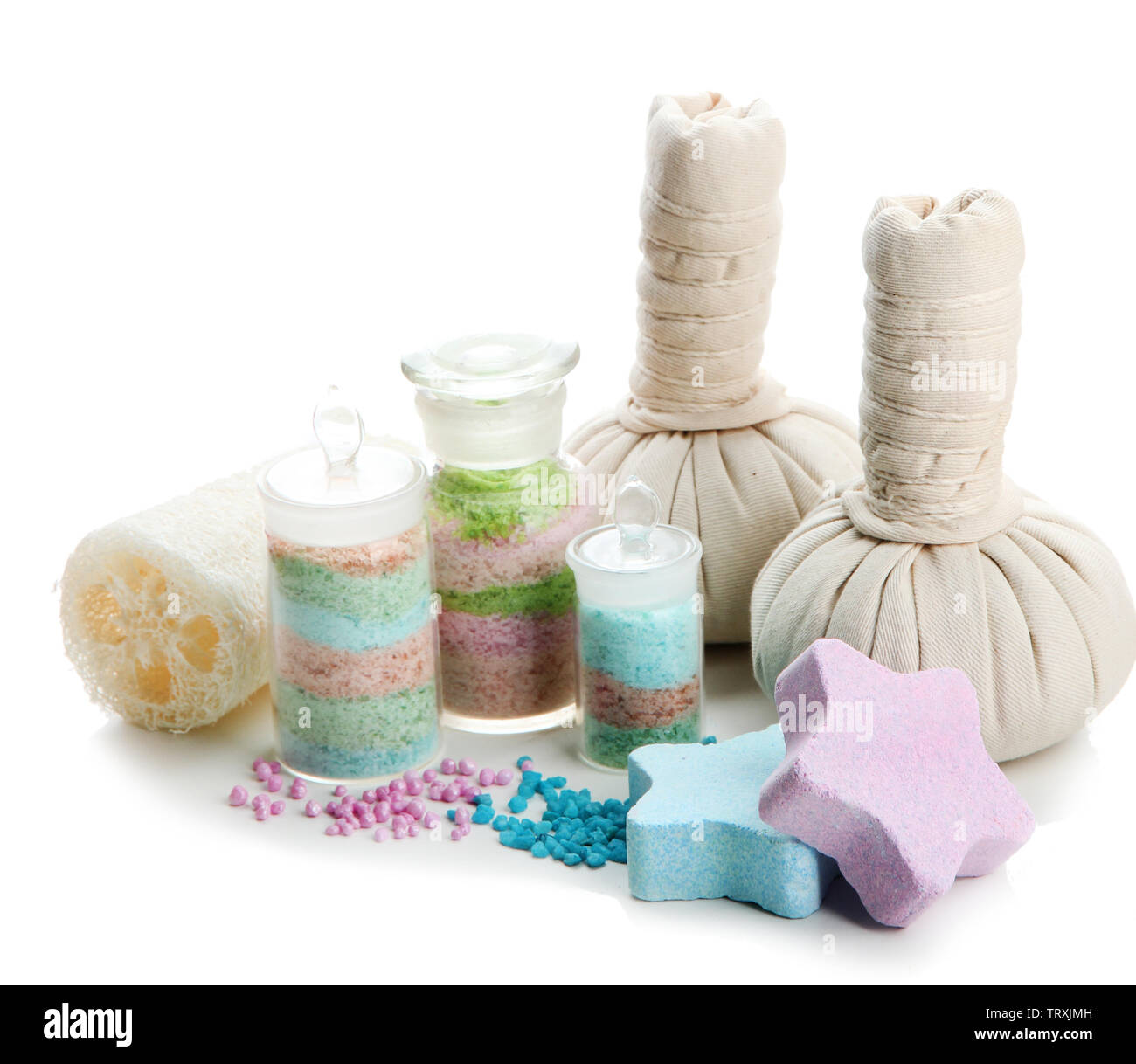 Aromatic salts in glass bottles and herbal compress balls for spa ...