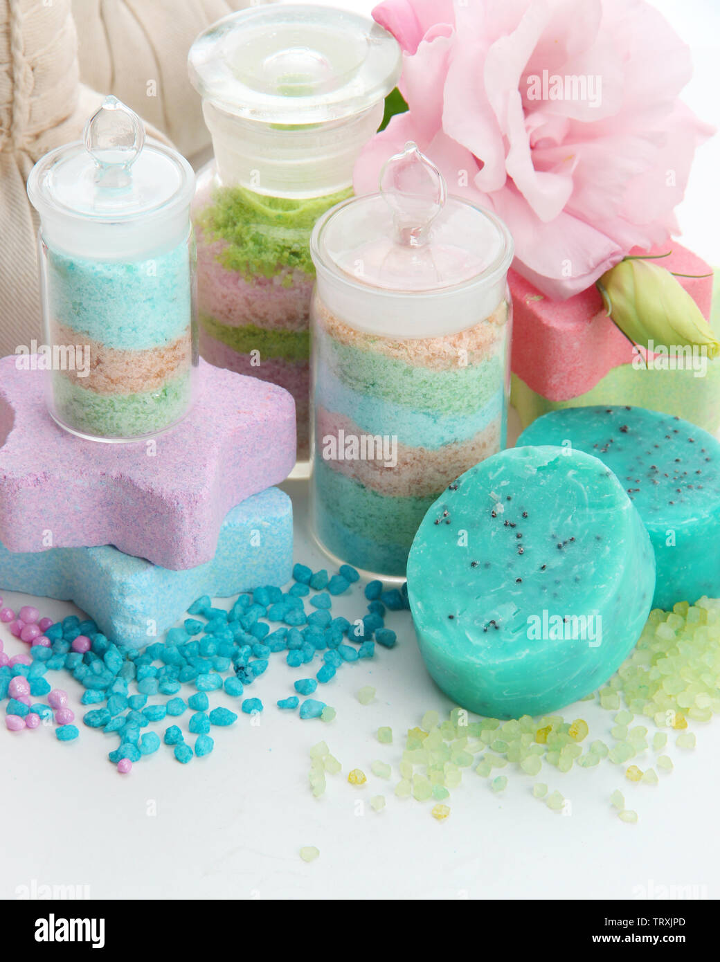 Aromatic salts in glass bottles and herbal compress balls for spa ...