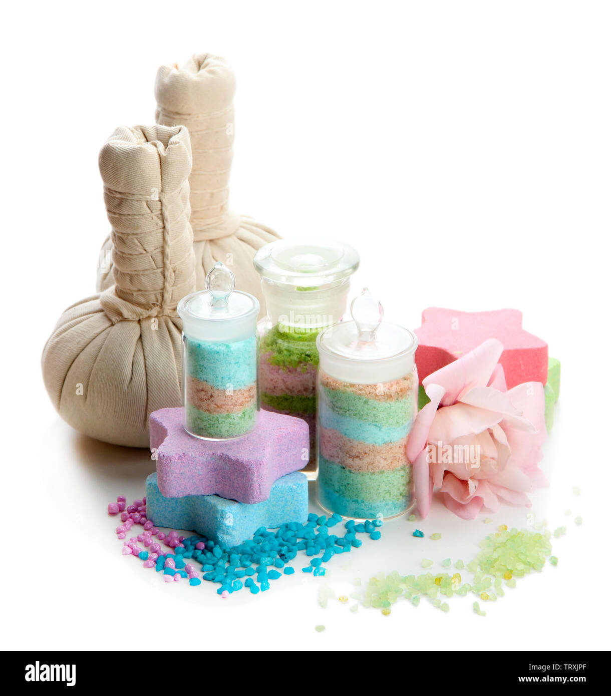 Aromatic salts in glass bottles and herbal compress balls for spa ...