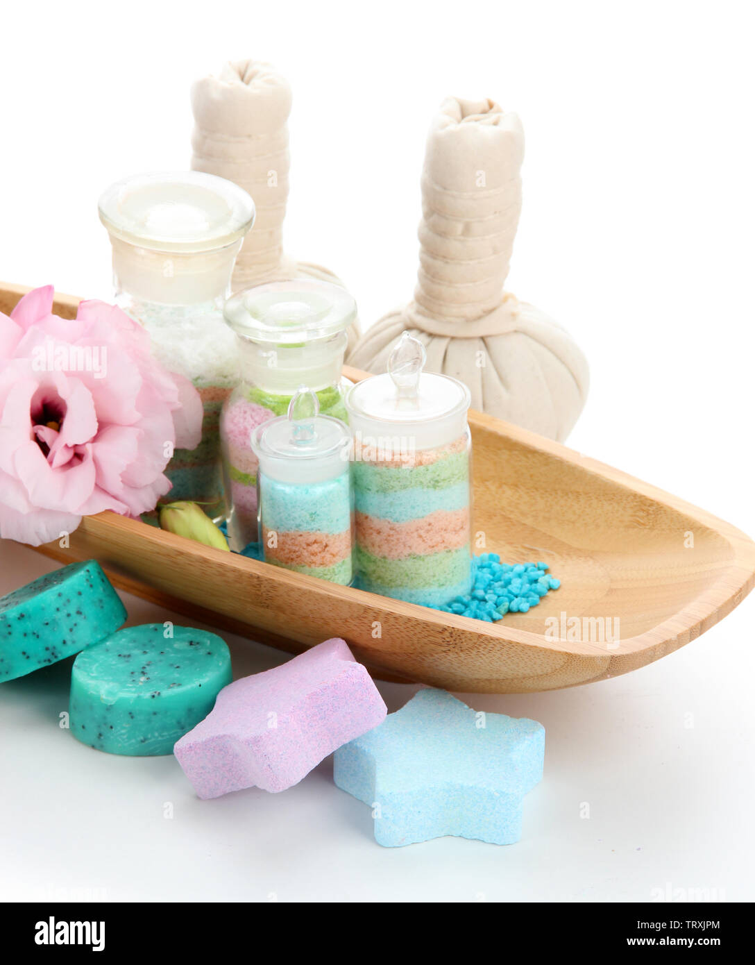 Aromatic salts in glass bottles and herbal compress balls for spa ...