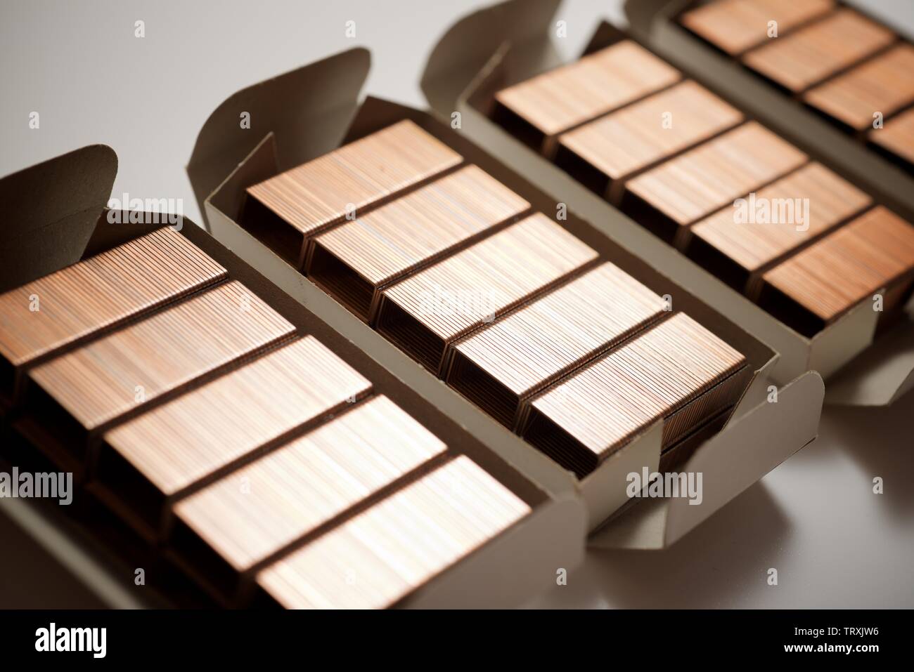 Staples on a white table Stock Photo - Alamy