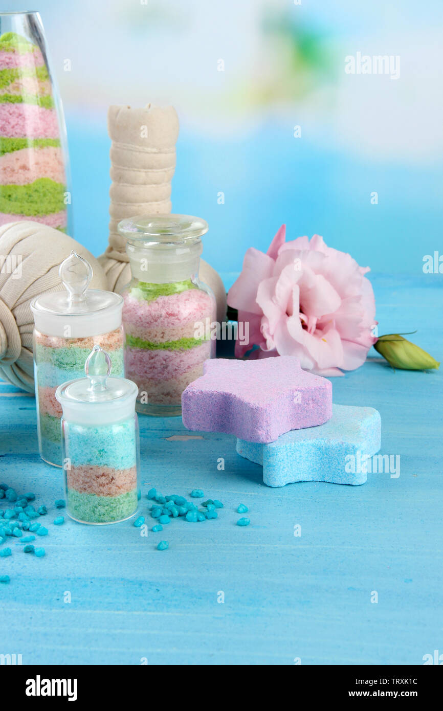 Aromatic salts in glass bottles and herbal compress balls for spa ...
