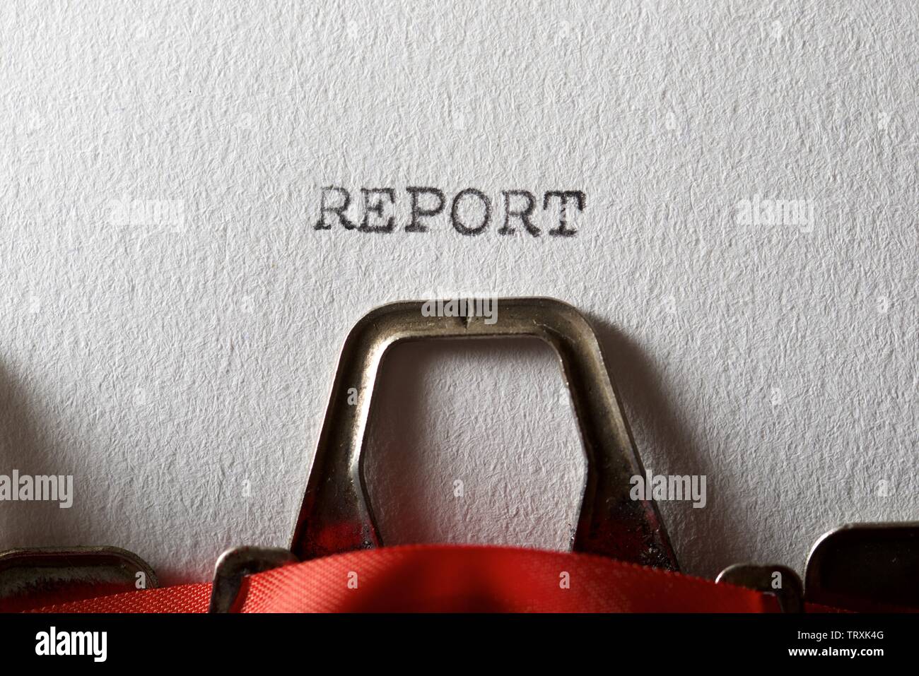 The word, Report, written with a typewriter Stock Photo - Alamy