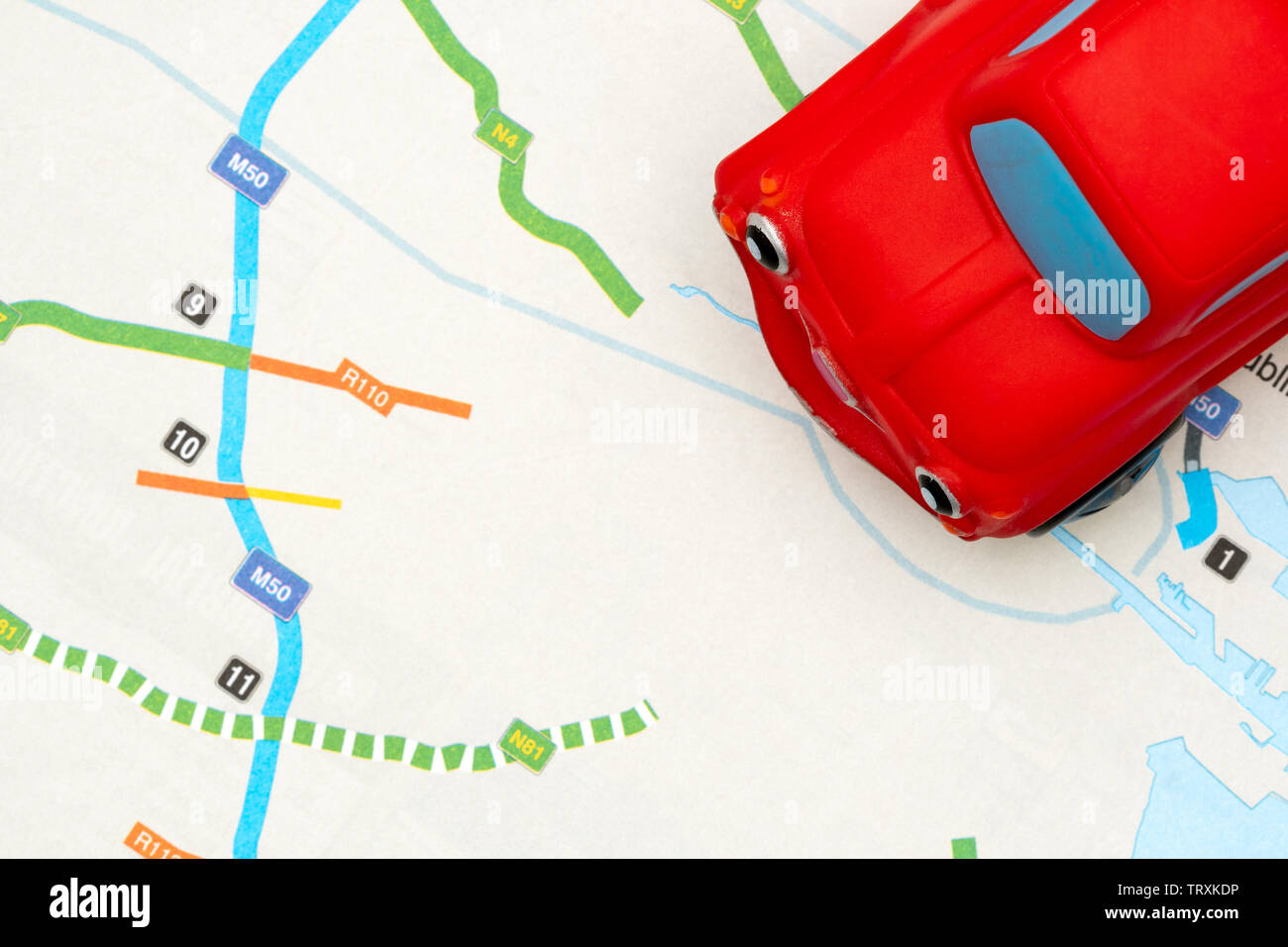 Trip planning concept - small toy car on the map, top view Stock Photo ...
