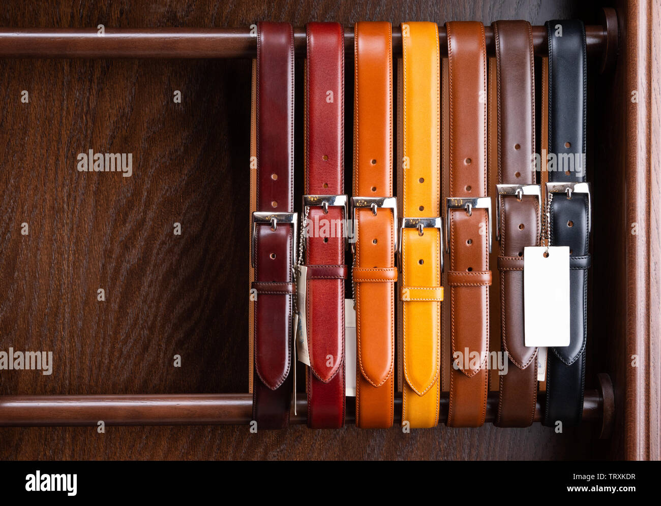 Different colored leather belts Stock Photo - Alamy