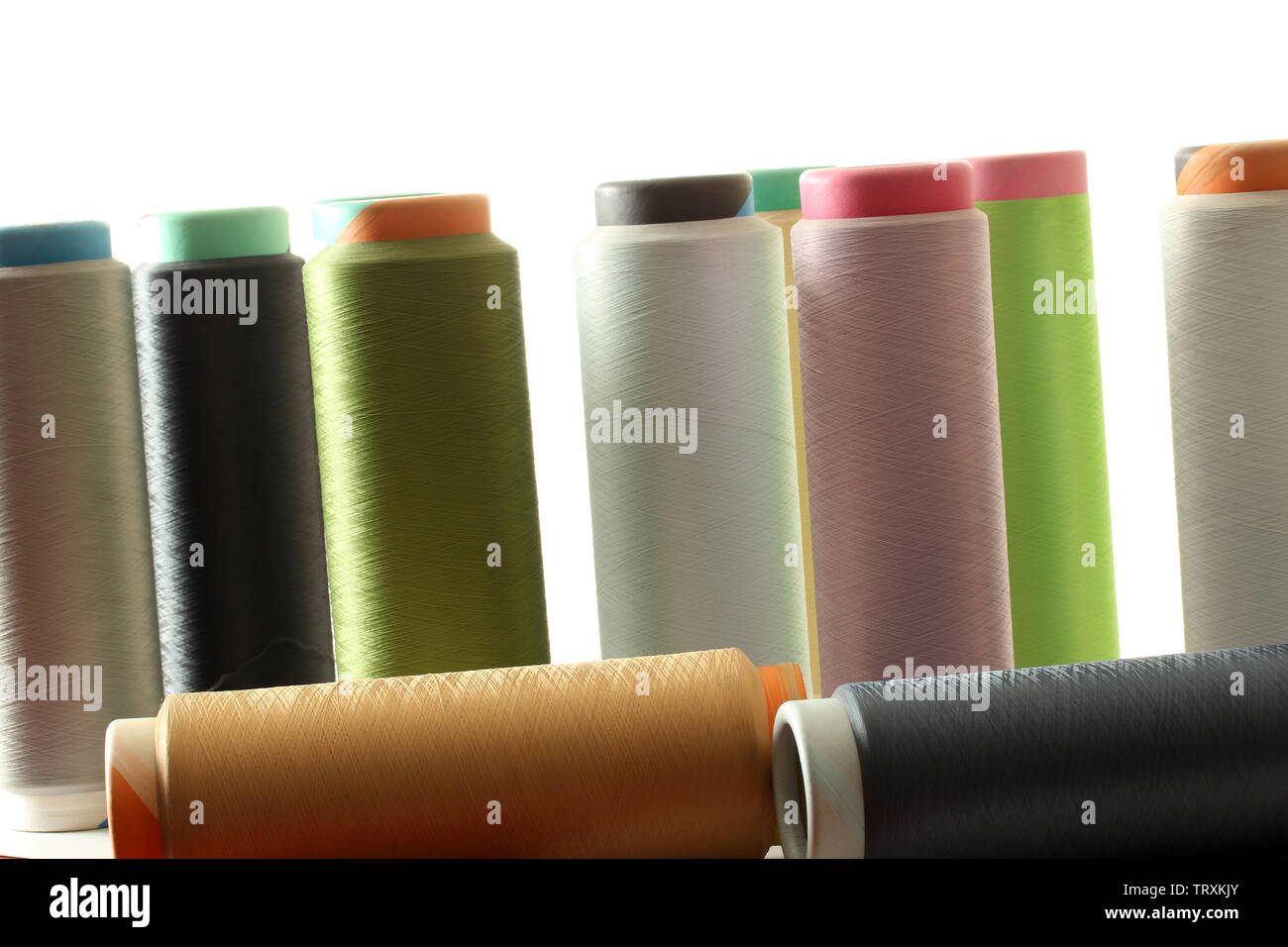 Colored sewing thread Stock Photo - Alamy