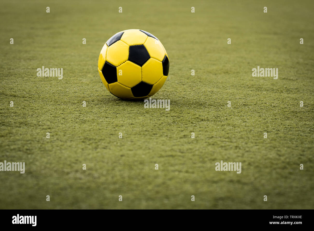 Yellow soccer ball hi-res stock photography and images - Alamy
