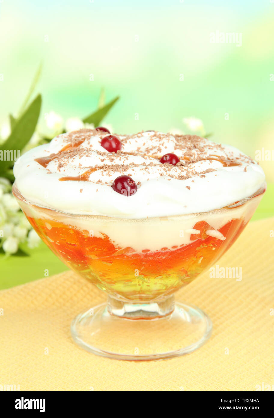 Tasty jelly in bowl on table on light background Stock Photo - Alamy