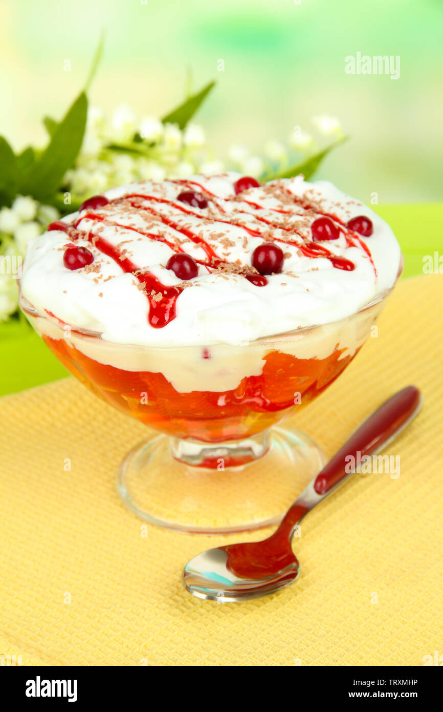 Tasty jelly in bowl on table on light background Stock Photo - Alamy