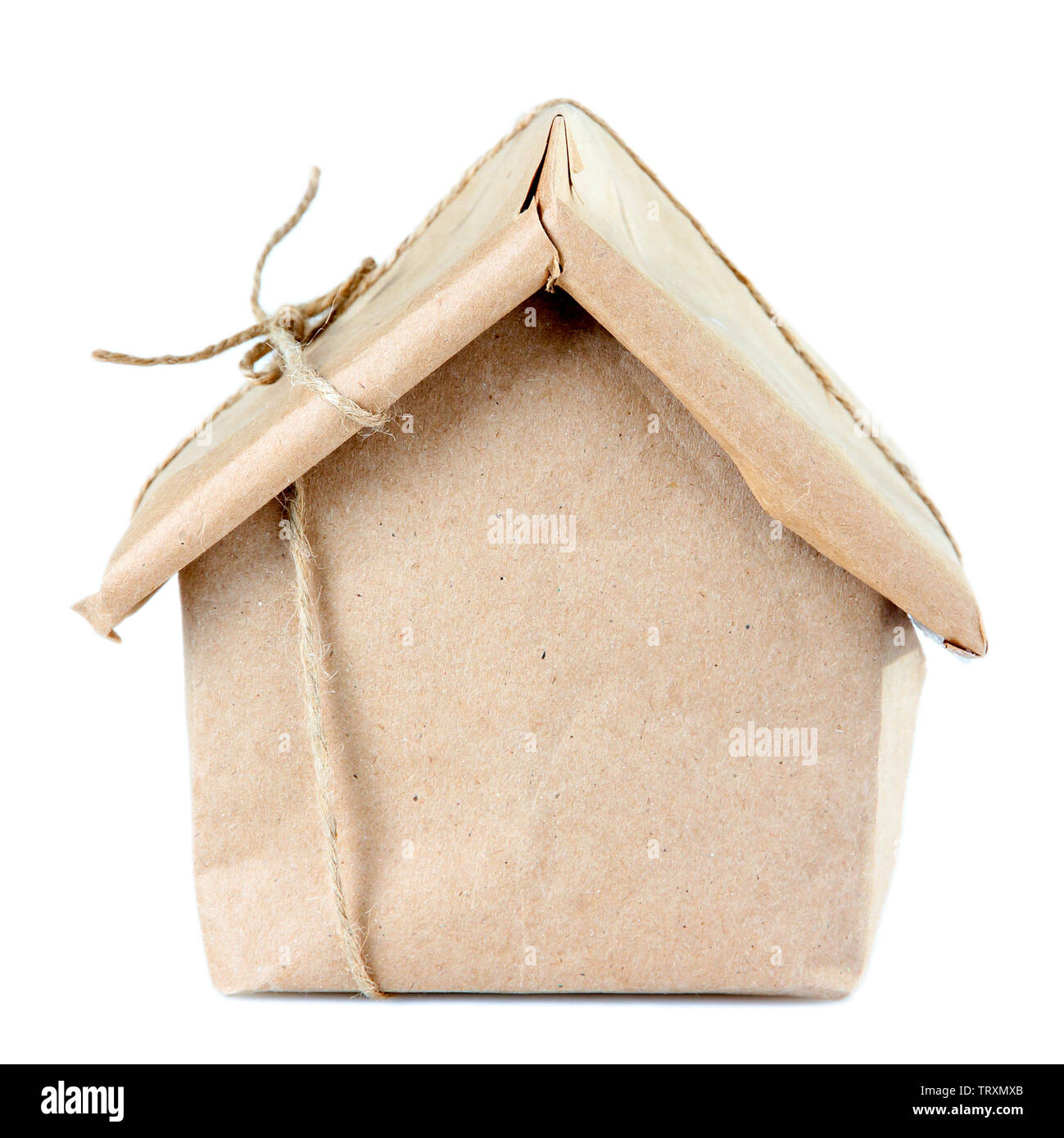 House wrapped in brown kraft paper, isolated on white Stock Photo - Alamy