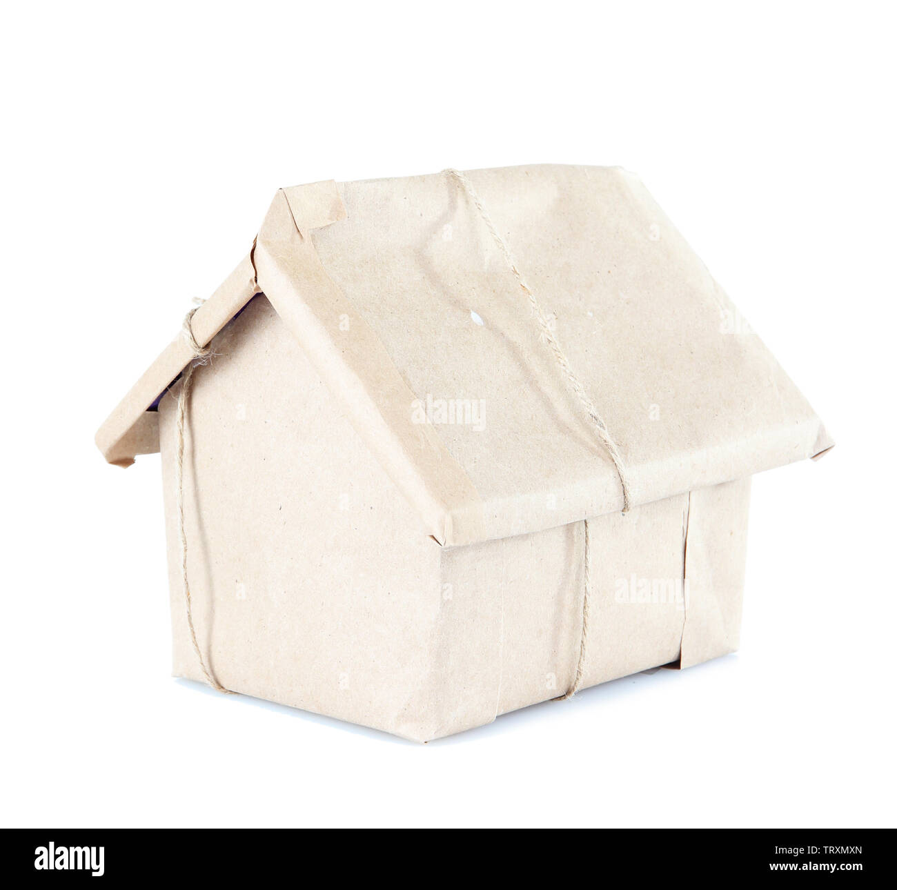House wrapped in brown kraft paper, isolated on white Stock Photo - Alamy