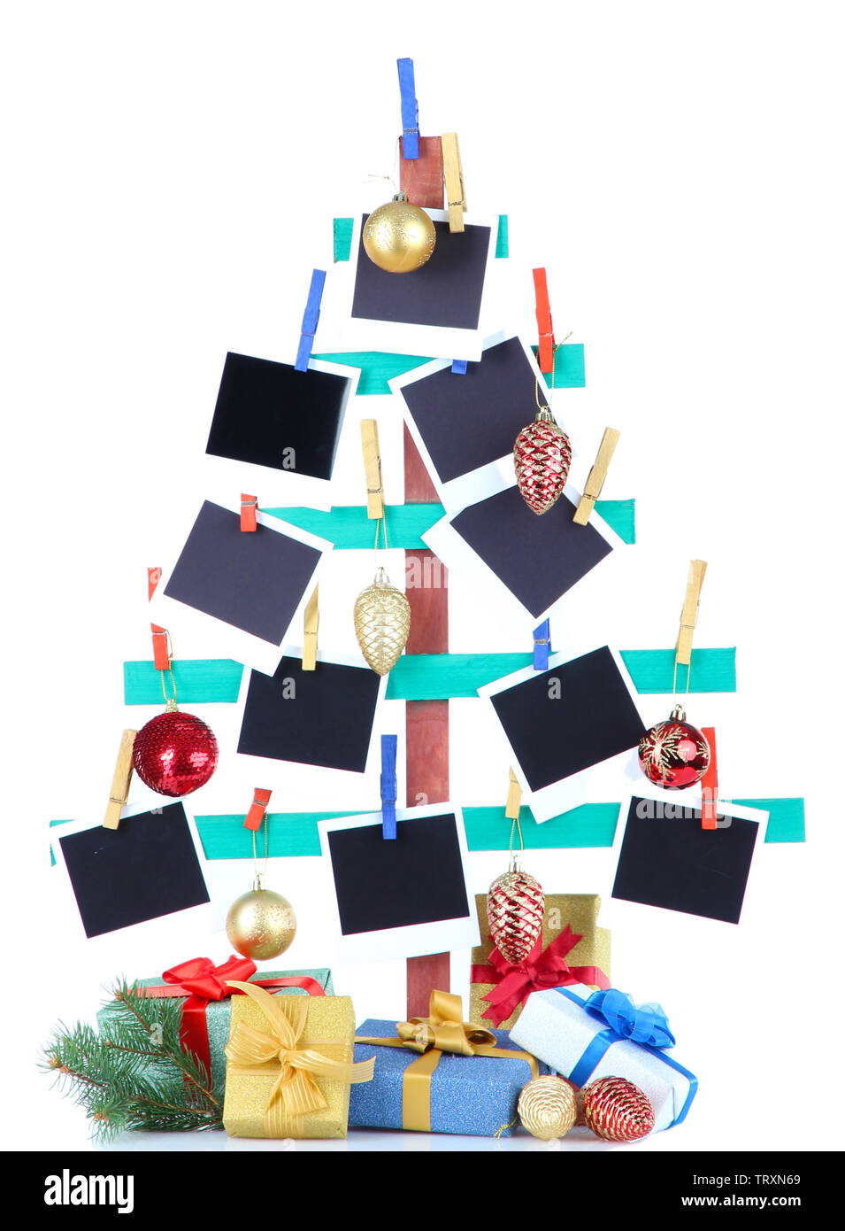 Wooden hand made fir tree with empty photo paper and Christmas decor ...