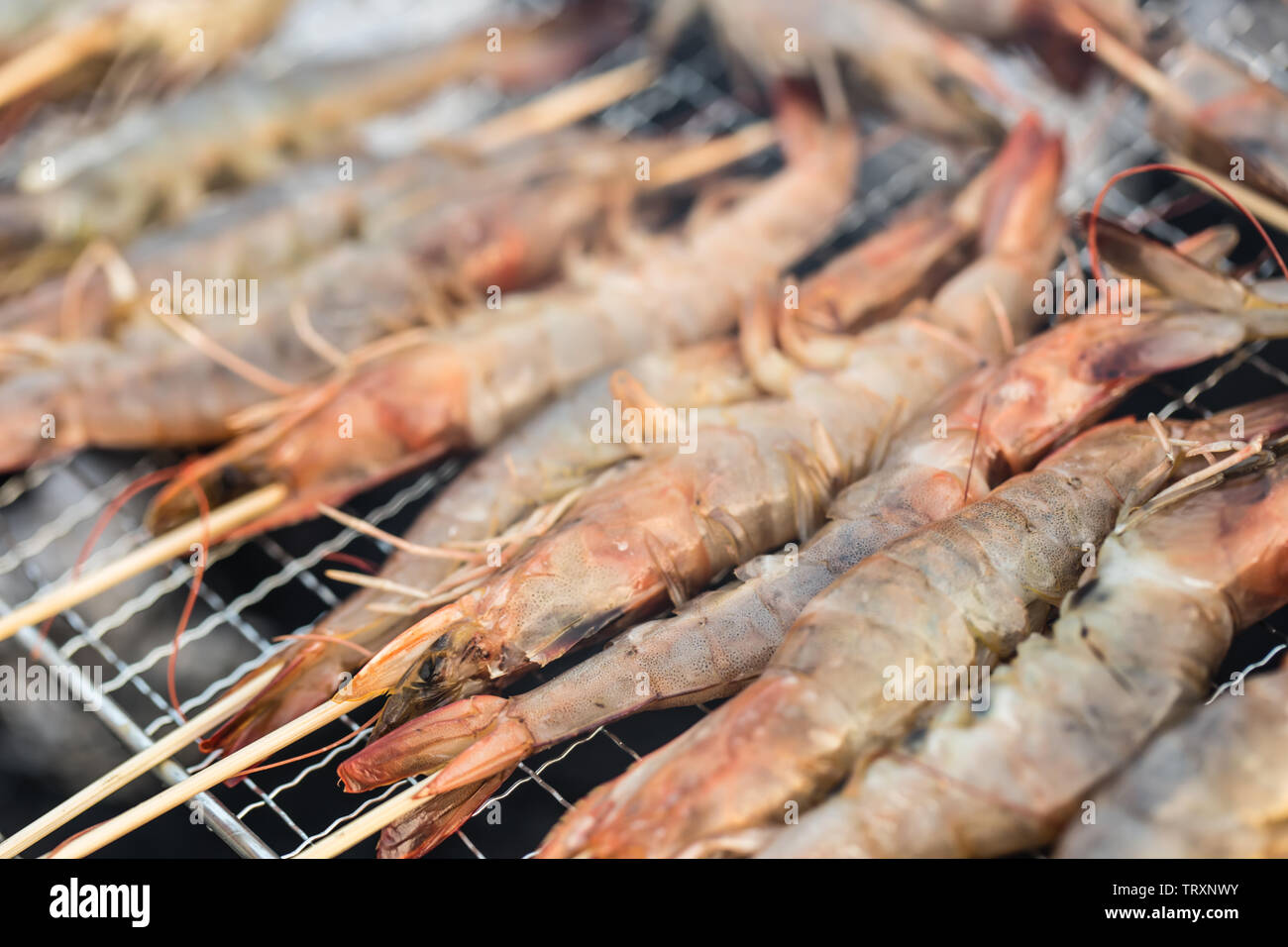 Many River Prawns was Grilled on traditional Stove Stock Photo - Alamy