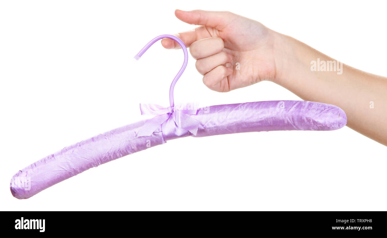 Beautiful hanger in hand isolated on white Stock Photo - Alamy
