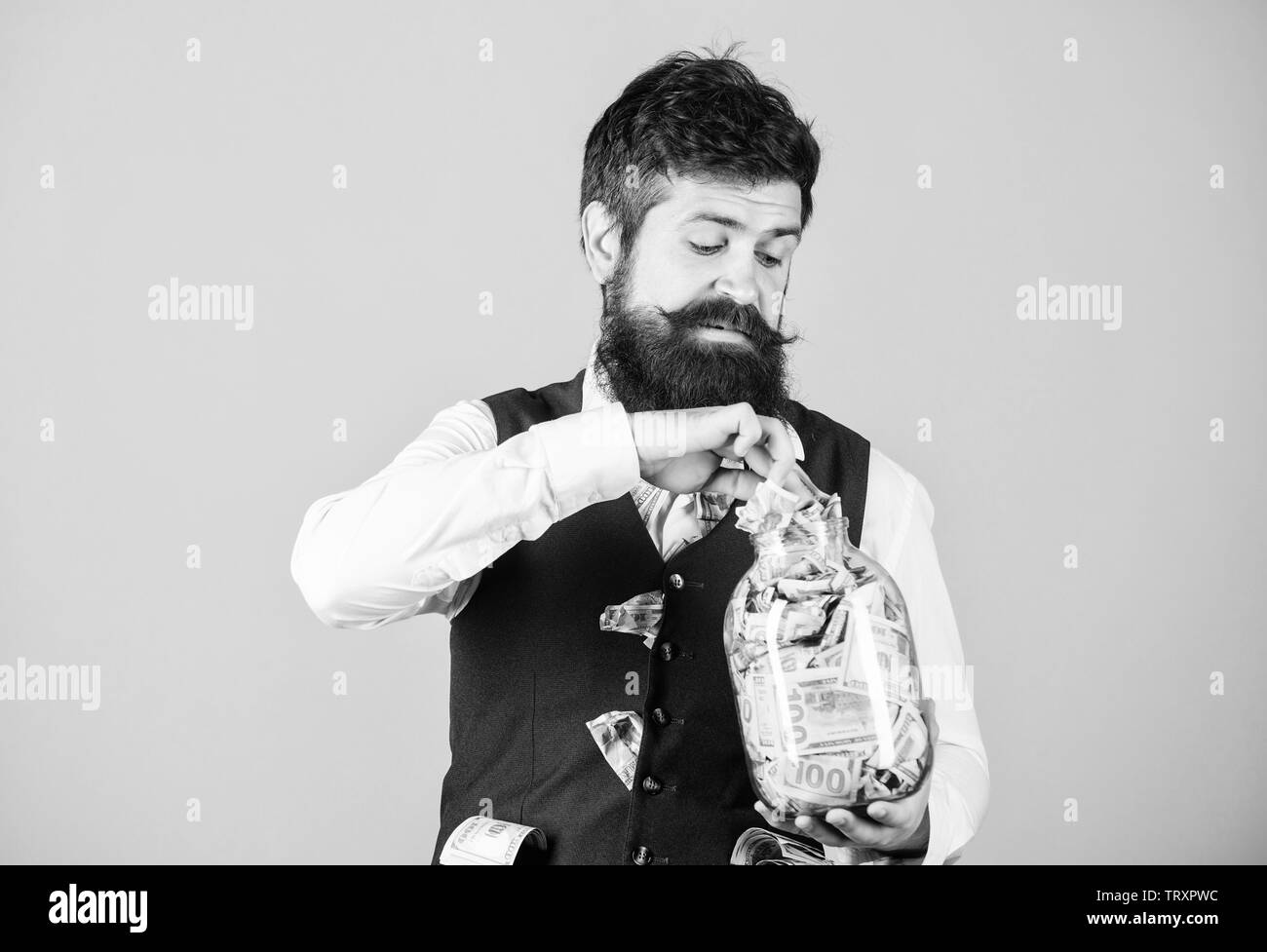 Businessman with his dollar savings. Richness and wellbeing. Security ...