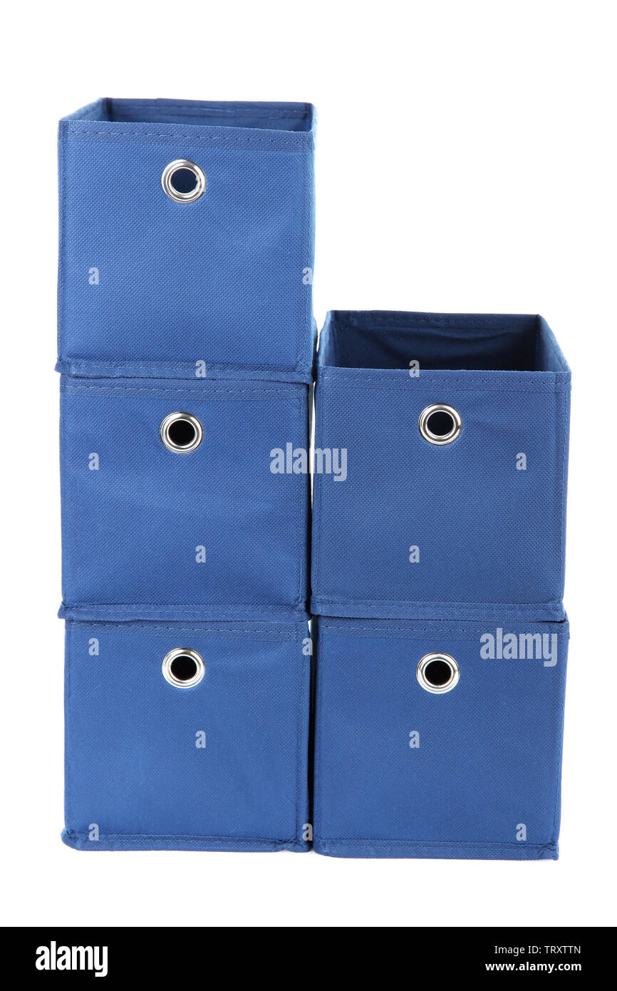 Blue textile boxes isolated on white Stock Photo - Alamy