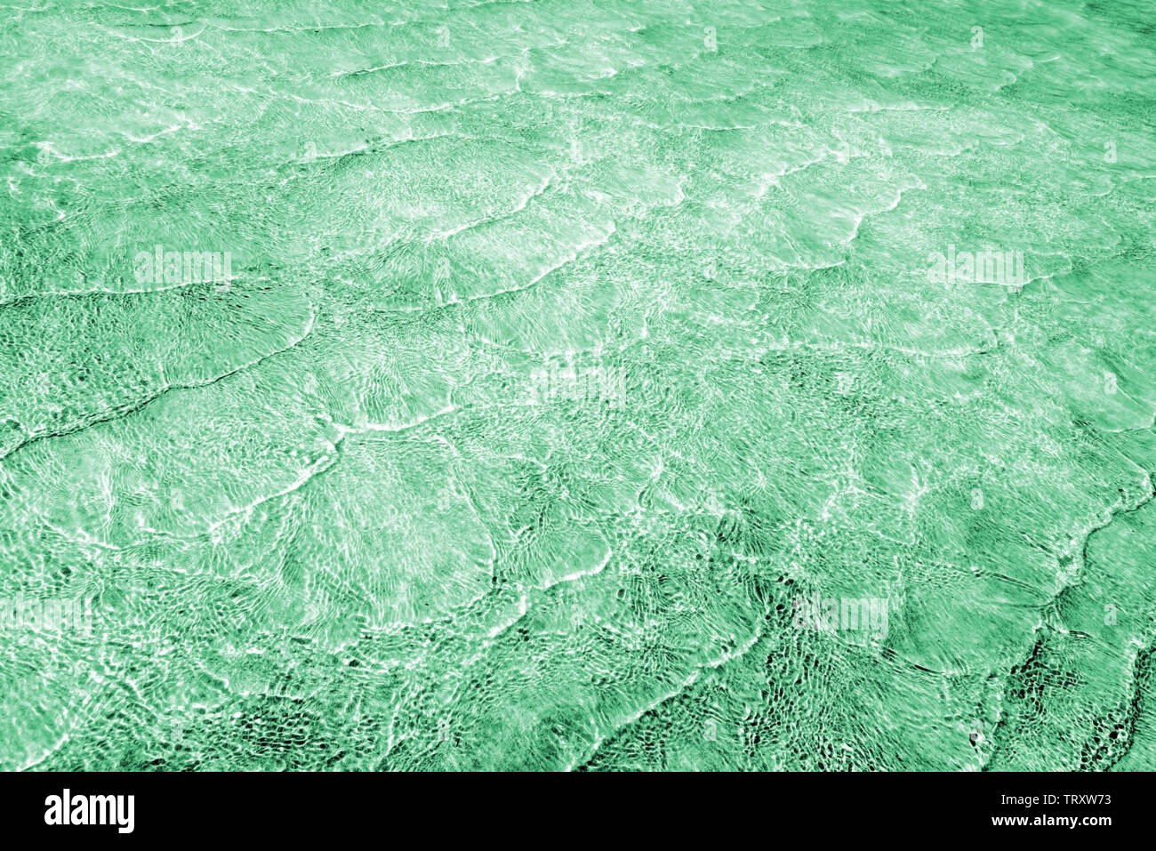 Empty abstract background naturally created by small sea waves in ...