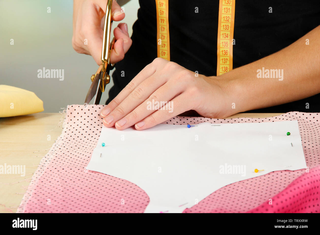 Cutting fabric hi-res stock photography and images - Alamy