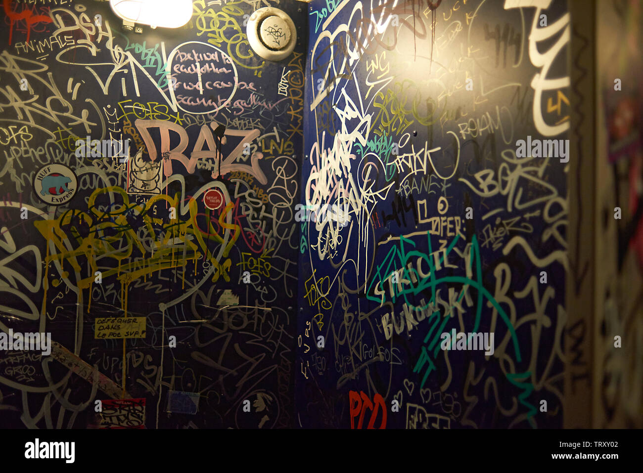 Interior of the walls full of graffiti in an old pub bar in the city ...