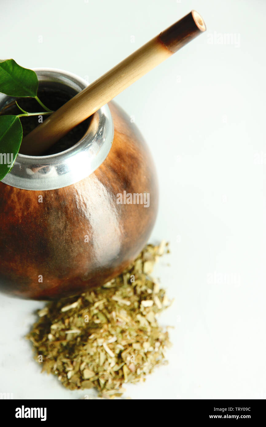 Calabash and bombilla with yerba mate isolated on white Stock Photo - Alamy