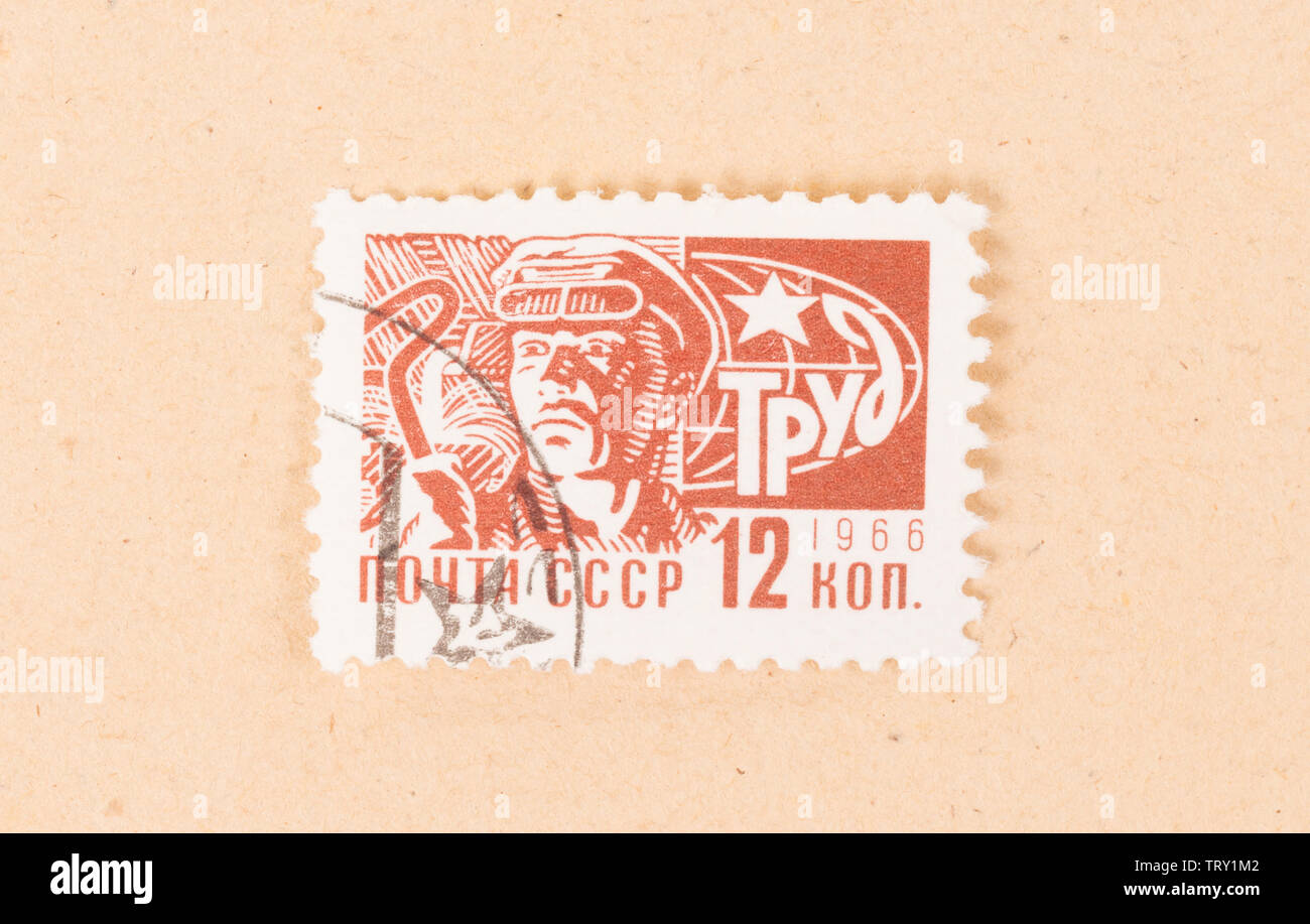 CCCP - CIRCA 1966: A stamp printed in the CCCP shows a working man ...