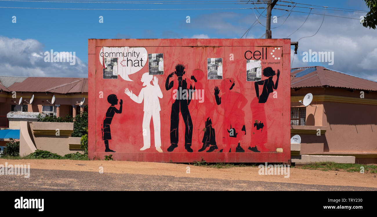 Brightly coloured shop made out of shipping container selling mobile ...